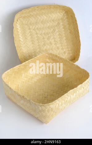Traditional containers made of bamboo white background Stock Photo - Alamy