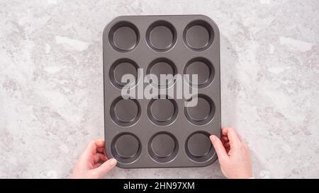 Flat lay. Step by step. Lining the baking pan with cooking foil to make ...