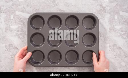 Flat lay. Step by step. Lining the baking pan with cooking foil to make ...