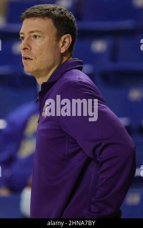 James Madison head coach Bob Chesney, right, talks with an official ...