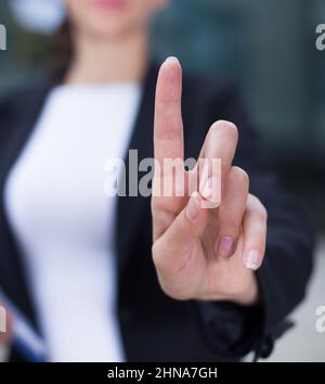 Manager is asking companion to wait Stock Photo - Alamy