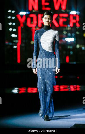 A model walks on the runway at the Tory Burch fashion show during Fall ...