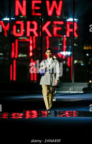 A model walks on the runway at the Tory Burch fashion show during Fall ...