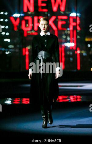 A model walks on the runway at the Tory Burch fashion show during Fall ...