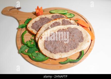 Manakish Arabian food; Lebanese food of Lahme bajeen manouche Stock ...