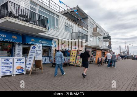 A view of food outlets by the harbour in the coastal settlement of West ...