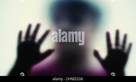 Child feeling trapped behind glass depression mental illness concept ...