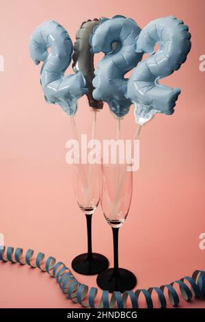 2022 numbers and New Year's gift on the background of New Year's lights ...