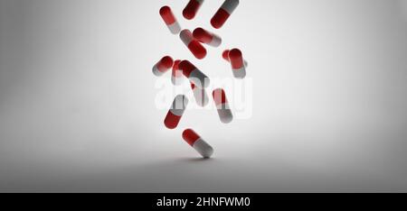 3D illustration of some falling capsules on a white background Stock ...