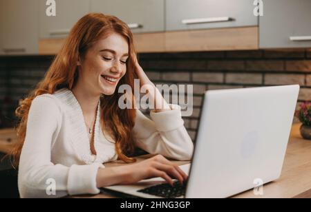 Lifestyle and Technology concept - Portrait of ginger red hair girl ...