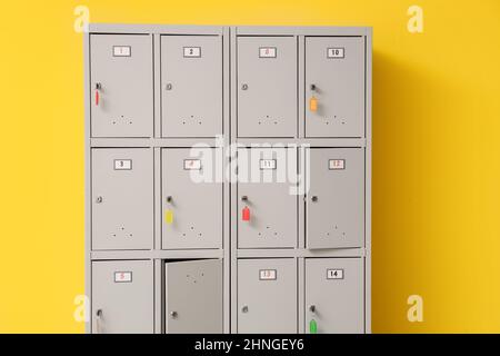 Modern locker near yellow wall Stock Photo - Alamy