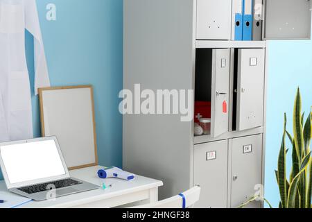 Interior of doctor's office with locker in clinic Stock Photo - Alamy