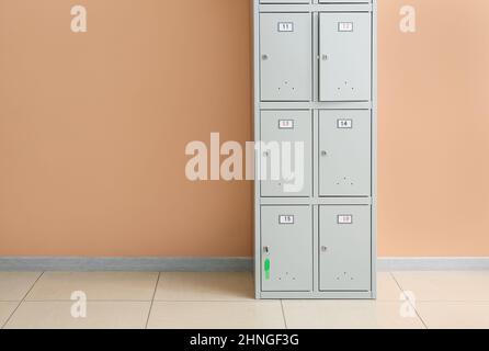 Modern locker near color wall Stock Photo - Alamy