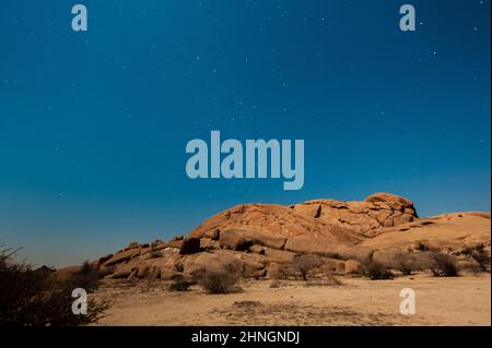 Night shot of the Namibian Desert near Spitzkoppe, under a clear starry ...