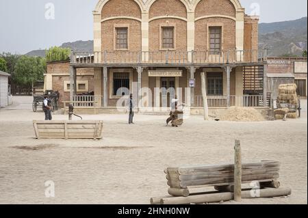 Wild west movie set with some men fighting in a gunfight Stock Photo ...