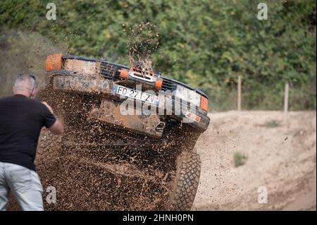 Second generation Range Rover jumping Stock Photo - Alamy