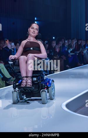 A model is seen on the runway at the PrettyLittleThing X Molly-Mae ...