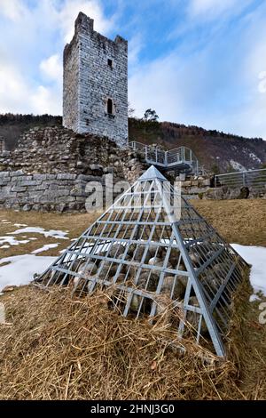The keep and ruined walls of Restor Castle. Duvredo, Comano Terme, Trento province, Trentino ...