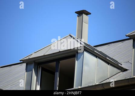 Dormer with zinc cladding on a tiled roof Stock Photo - Alamy