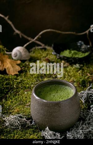 Traditional japanese hot green frothy tea matcha in ceramic cup ...