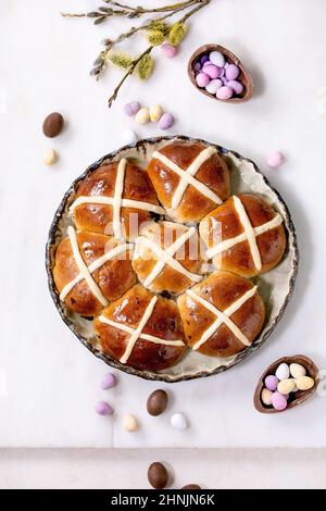 Easter eggs and blooming cherry on old wooden background. Festive ...