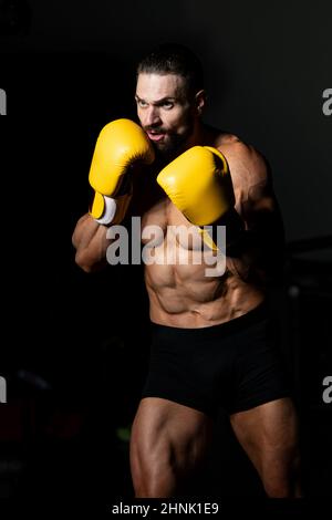 Muscular competitive man, boxing, mma athletes with drawn head of ...