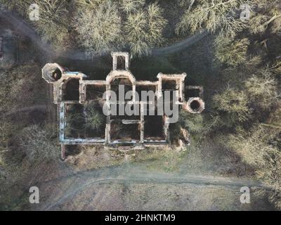 Top view of the destroyed building. Aerial view of the ruins. top view ...
