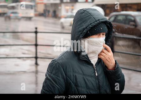 26 of October 2020, Tomsk, Russia: woman in medical mask with closed ...