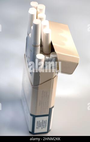 different types of cigarettes on a white background Stock Photo - Alamy