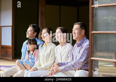 Three-Generations Japanese Family Sitting On The Porch Stock Photo - Alamy