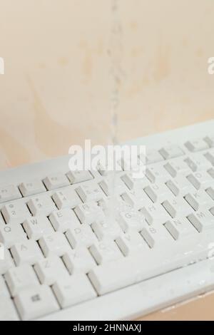 Keyboard in the water, waterproof keyboard, spilled water on the ...