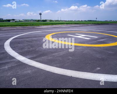 Private Helicopter sing parking area in airport Stock Photo - Alamy