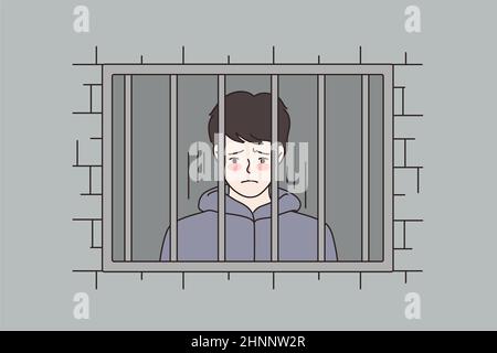 Sad man behind bars in heart prison Stock Photo - Alamy