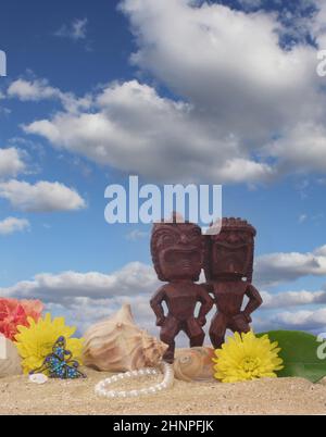 Flowers and Sea Shells on Sand With Sunset Stock Photo - Alamy