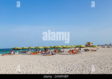 People at the sea side in South Beach, Miami Stock Photo - Alamy