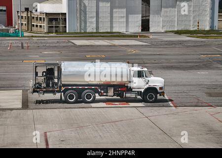 Fuel Tank Trucks at an airport with jet fuel Stock Photo - Alamy