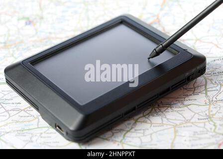 GPS global positioning device arranged with stylus pen and map Stock ...