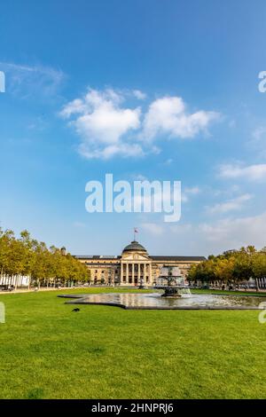 Germany, Famous Kurhaus building in Wiesbaden city park behind water ...
