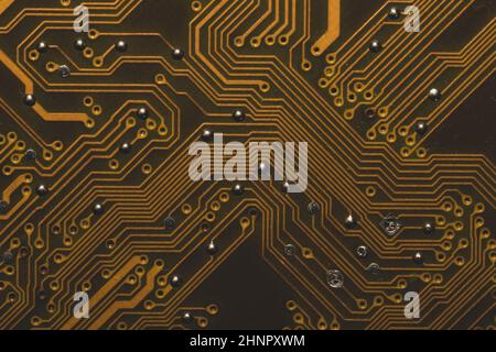 Burnt circuit board abstract background. spoiled motherboard close up ...