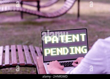 Text sign showing Patent Pending. Business photo showcasing Request ...