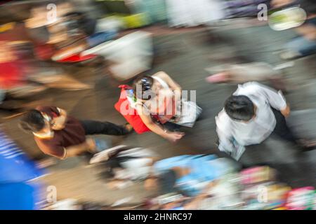 people hurry along the sidewalk Stock Photo - Alamy