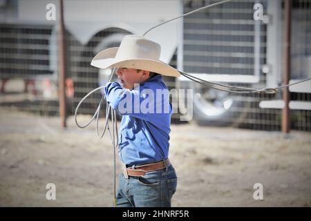 practice FOR ROPING CONTEST BETWEEN 5 AND 6 YEAR OLD boys at small ...
