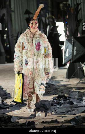 A model walks the runway at the VIN + OMI 'Opinions' catwalk show ...