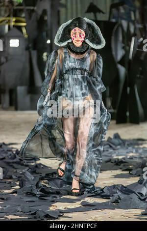 A model walks the runway at the VIN + OMI 'Opinions' catwalk show ...