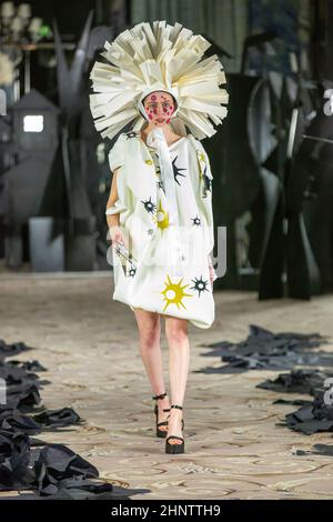 A model walks the runway at the VIN + OMI show during London Fashion ...