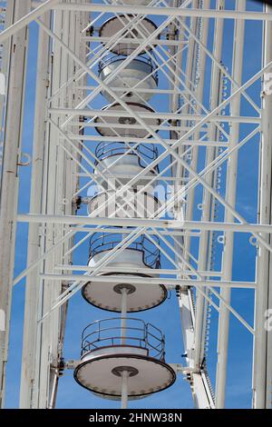 detail of empty ferris wheel under blue sky Stock Photo - Alamy