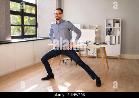 Standing Office Yoga Workout And Workout Near Business Computer Stock ...
