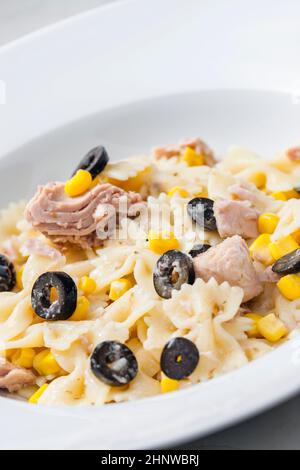 Pasta Farfalle with fresh Tuna fish and tomato Stock Photo - Alamy