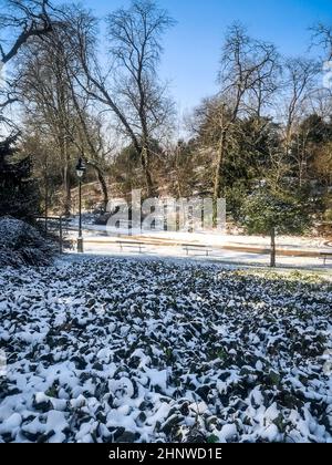 Buttes-Chaumont Park under the snow in winter, Paris Stock Photo - Alamy