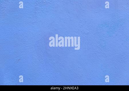 typical painted blue plaster wall of an old house in the provence Stock ...